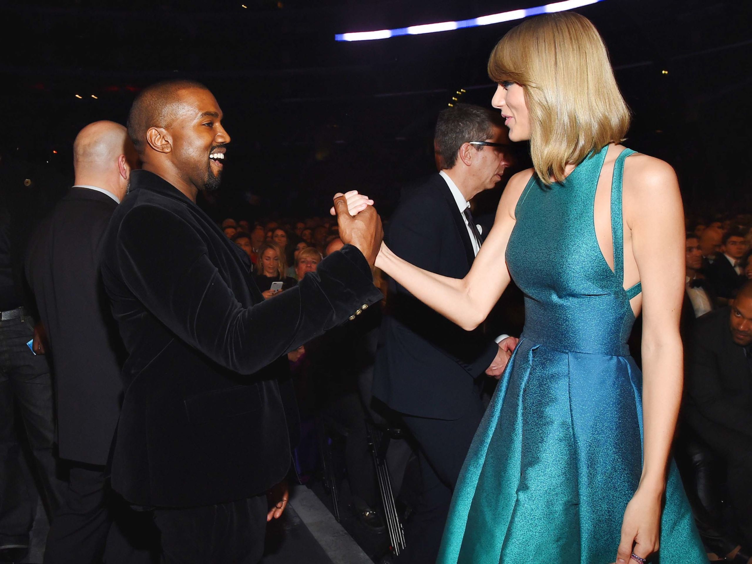 Kanye West And Chris Brown Holding Hands
